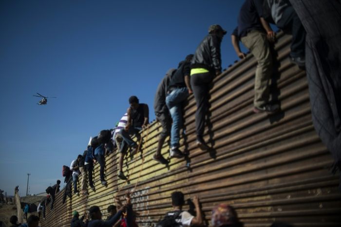 US Agents Fire Tear Gas At Migrants Trying To Cross From Mexico - i24NEWS