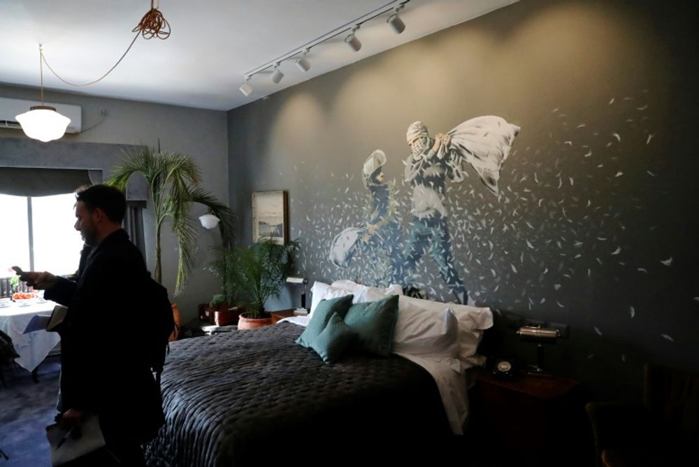 Street Artist Banksy Opens Walled Off Hotel In Bethlehem - i24NEWS