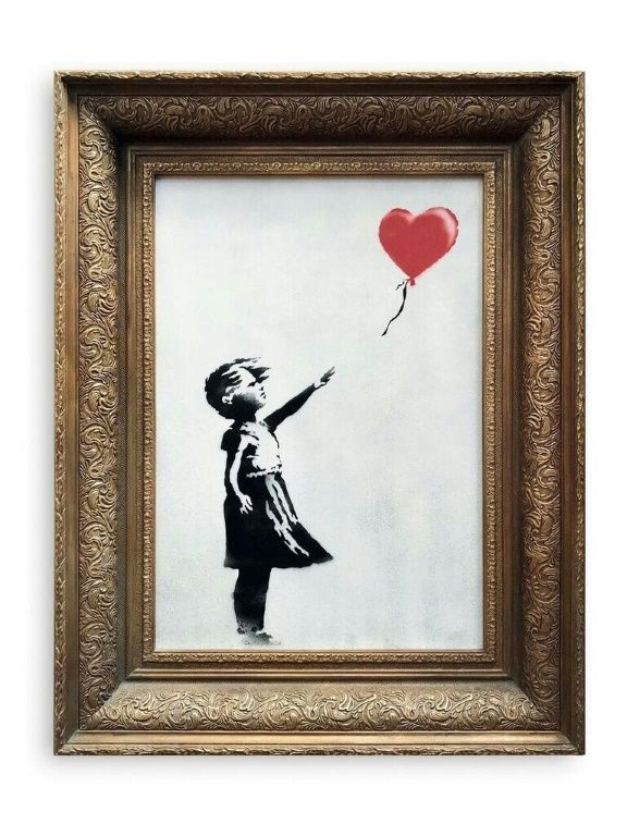 Banksy Shocks Art World By Shredding £1 Million Work At Auction - i24NEWS