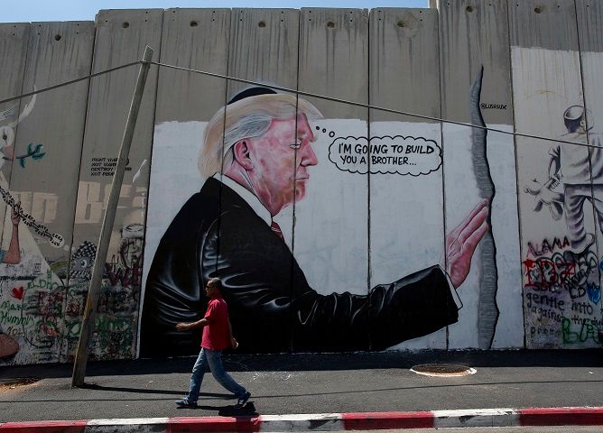 Trump Murals Appear On Israel's West Bank Security Barrier - i24NEWS