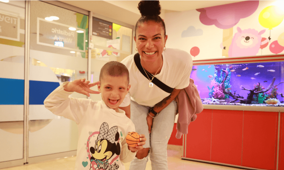 WBNA Star Alysha Clark Makes Surprise Visit To Israeli Hospital - i24NEWS