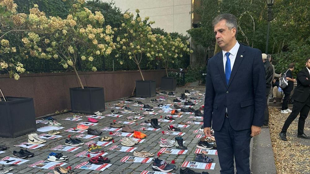 220 Pairs Of Shoes: Eli Cohen Visits "Bring Them Home" Exhibit In New ...