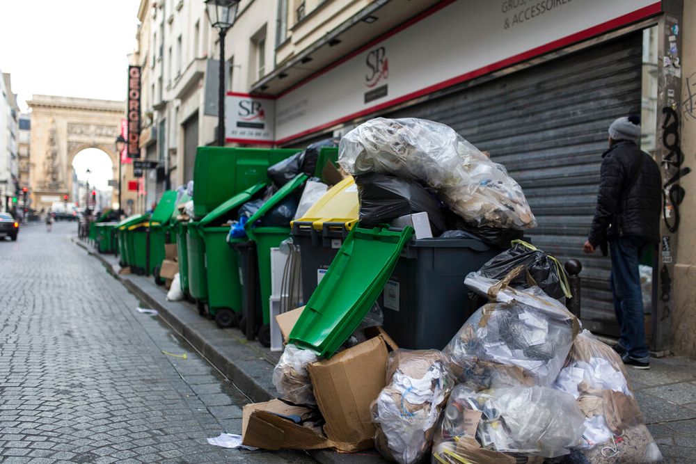 Overflowing Trash Bins Line The Streets In Strike-hit Paris - i24NEWS
