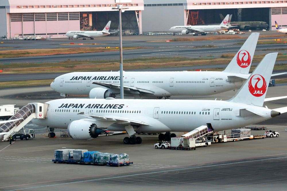 Japan Airlines Plane Snaps In Half After Fiery Collision On Tokyo ...