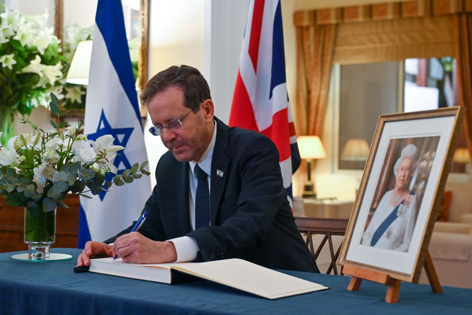 Israel's Herzog Signs Condolence Book For Queen Elizabeth II - i24NEWS